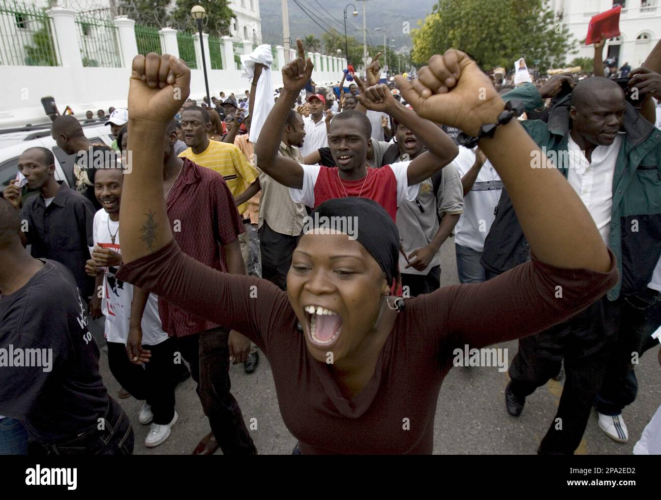 Demonstrators chant slogans against kidnapping during a march in Port ...
