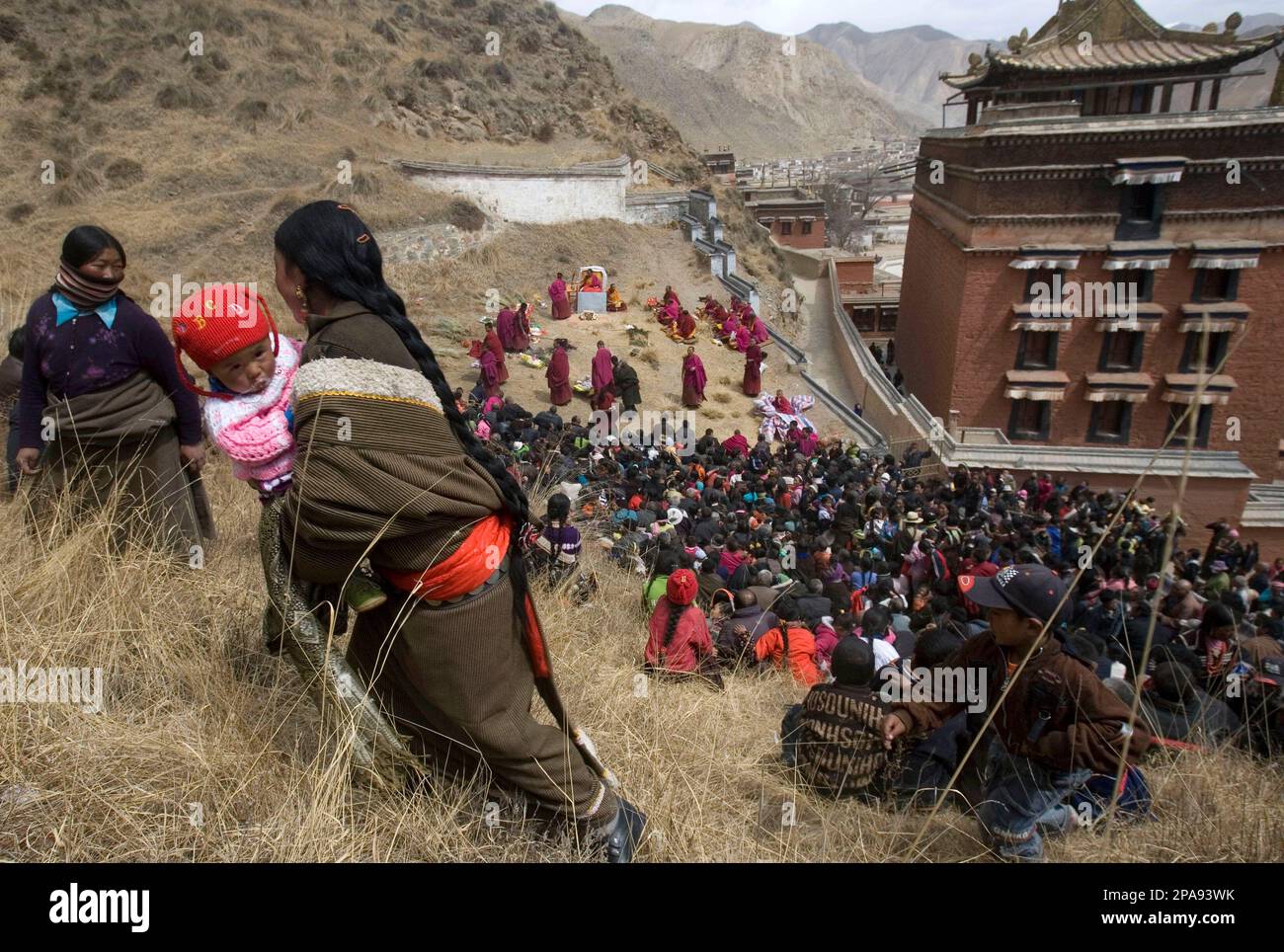 Tibetan monks are seen during a festival at the Labrang monastery as ...