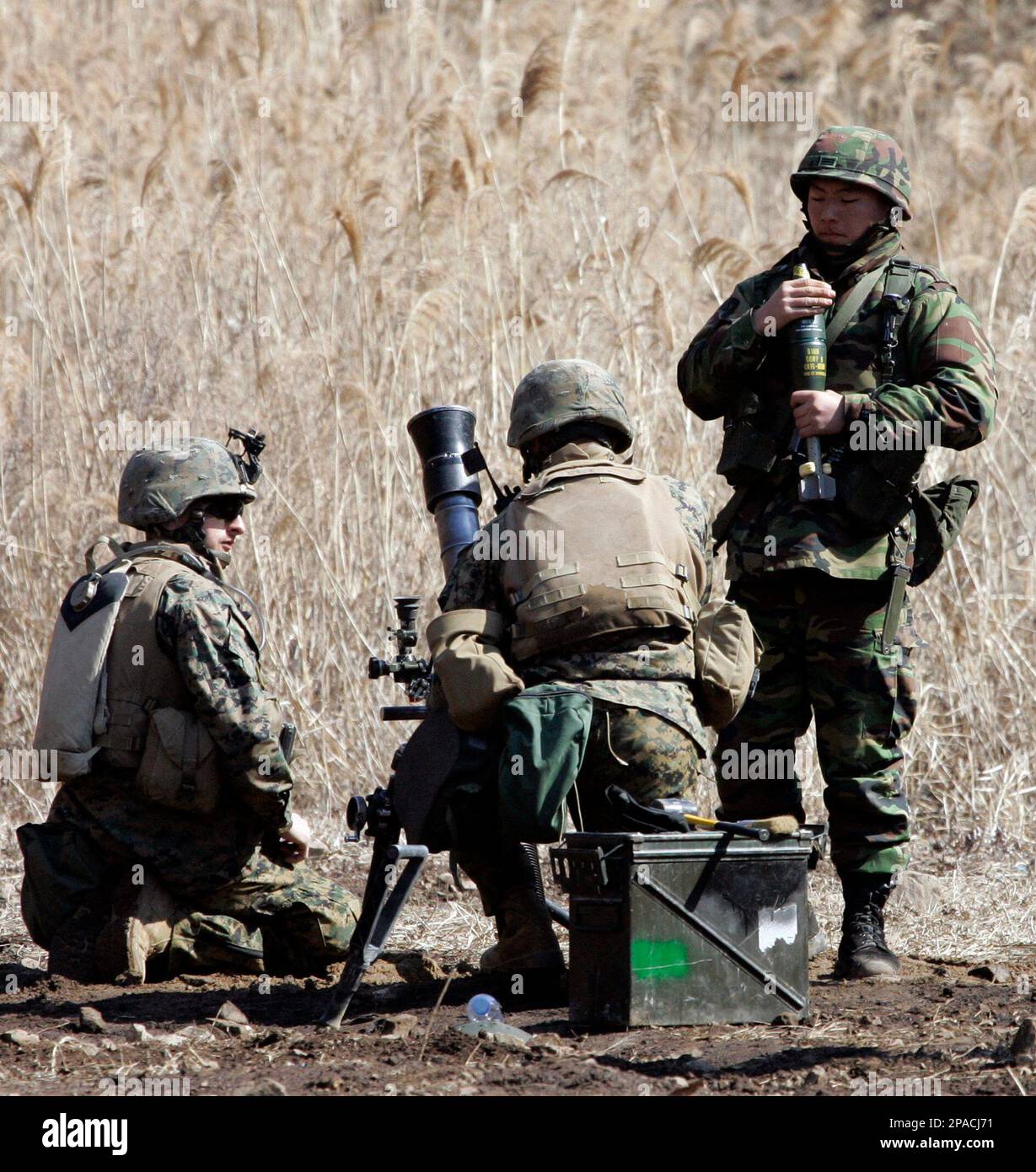 U.S. and South Korean Marines prepare for an attack during a combined ...
