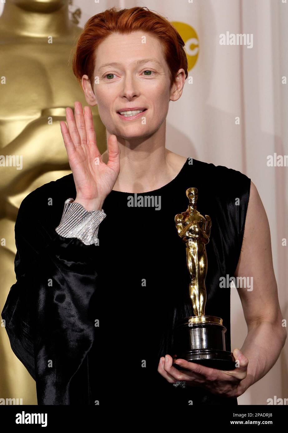** FILE **British actress Tilda Swinton poses with the Oscar for best ...