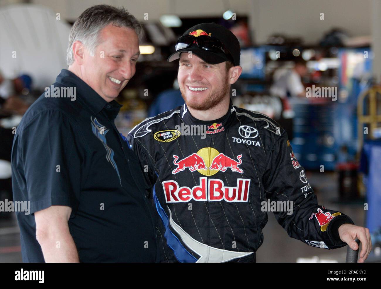 Brian Vickers, right, talks with crew chief Devin Hamlin, left, during ...