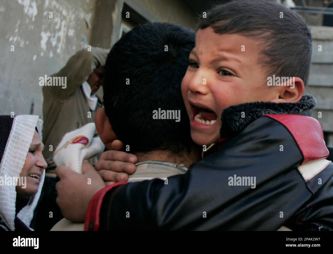 Relatives of Palestinians Mahmoud and Abed Alsalam Abu-Alaban, killed ...
