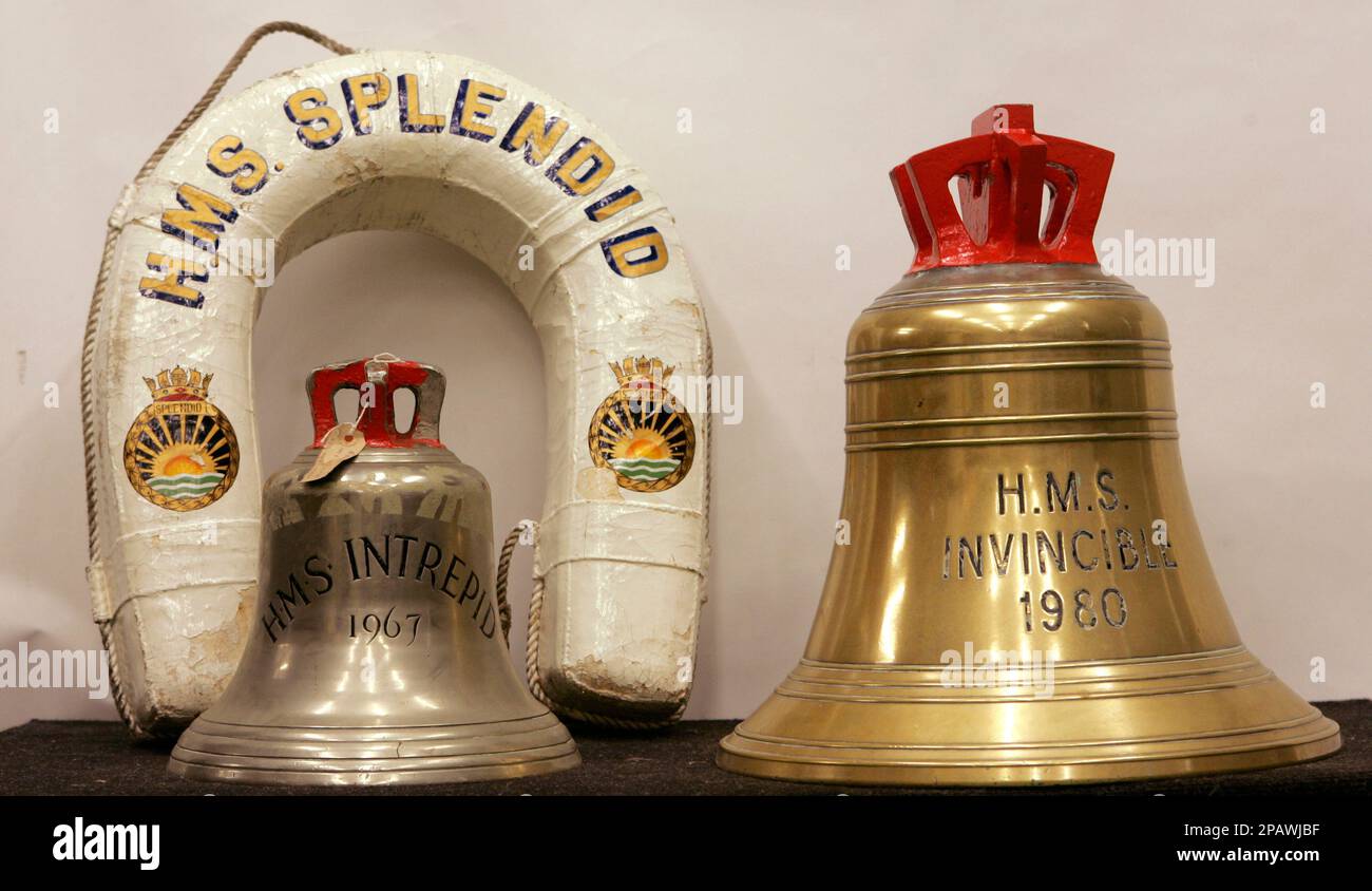 Two Royal Naval ships bells, from HMS Intrepid, front left, and one ...