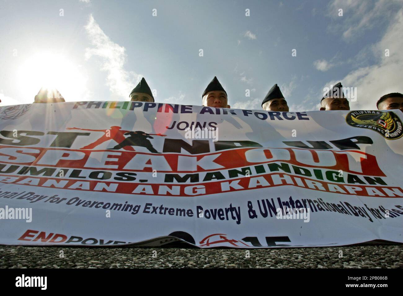 Philippine Air Force personnel display a streamer as they join a ...