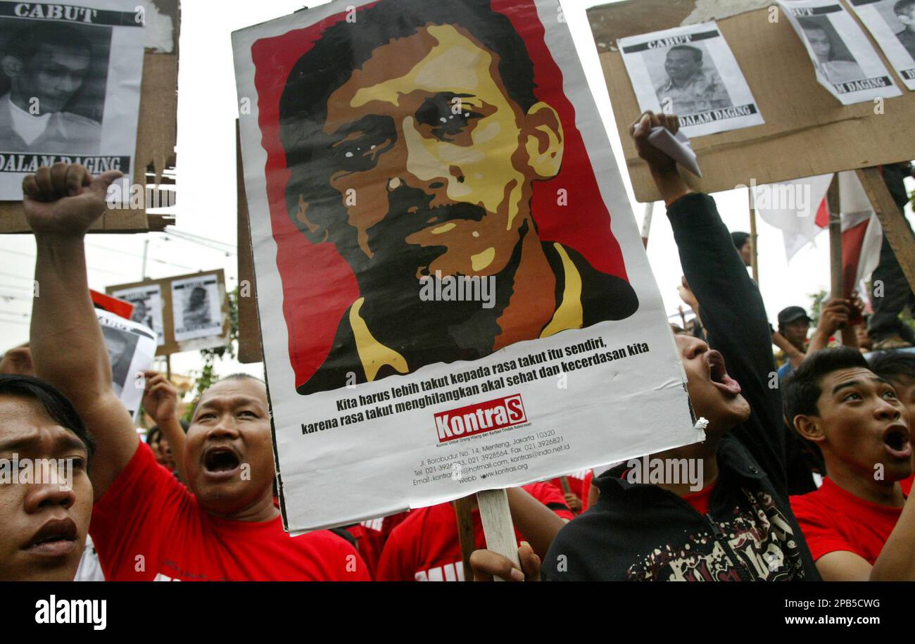 Indonesian protesters display posters of prominent human rights ...