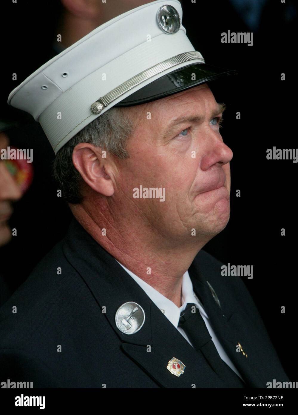 Kevin Kilgannon, a retired New York Fire Department lieutenant, reacts ...