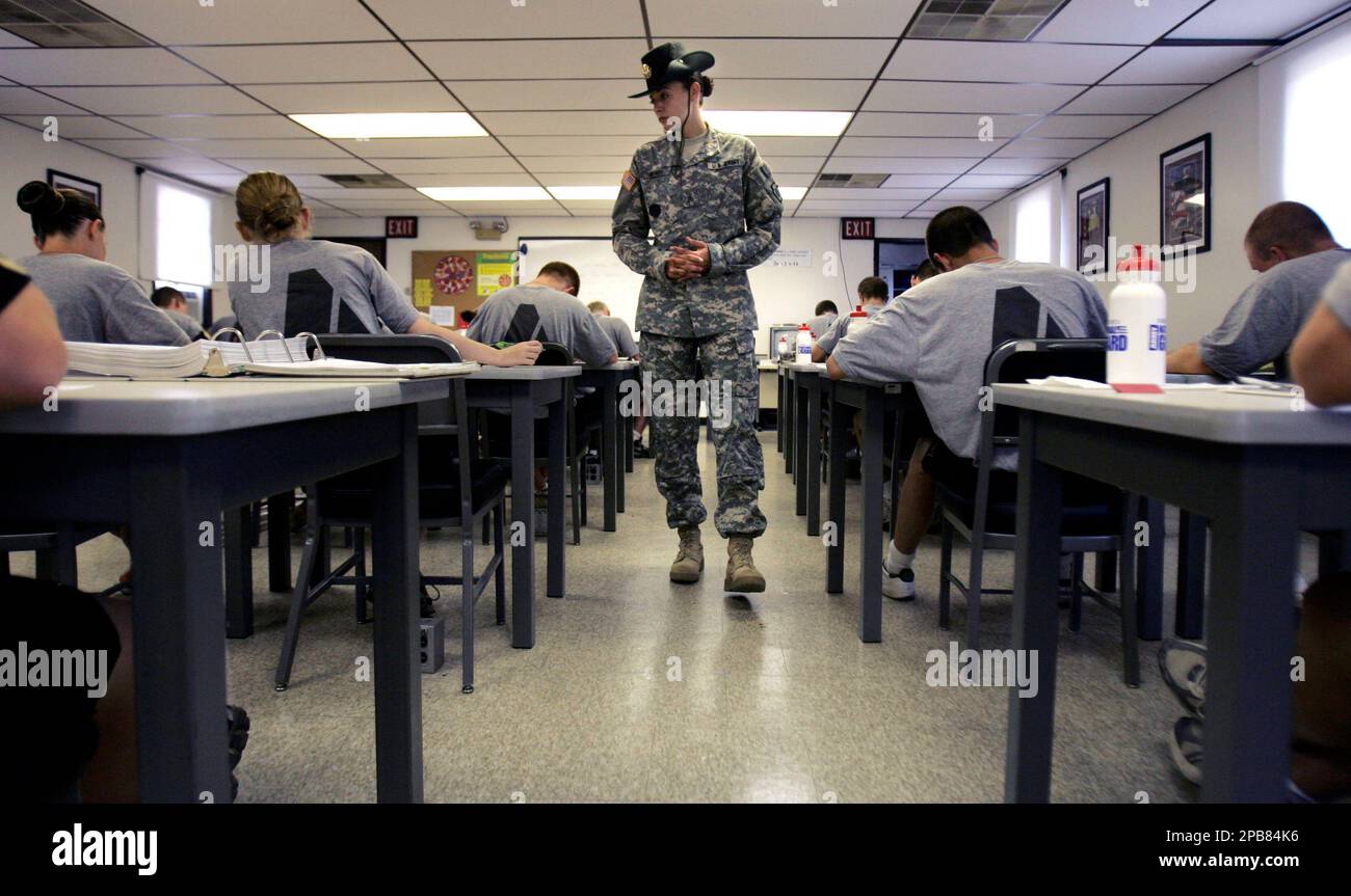 Drill Sergeant Ashley Neary watches over students as she walks through ...