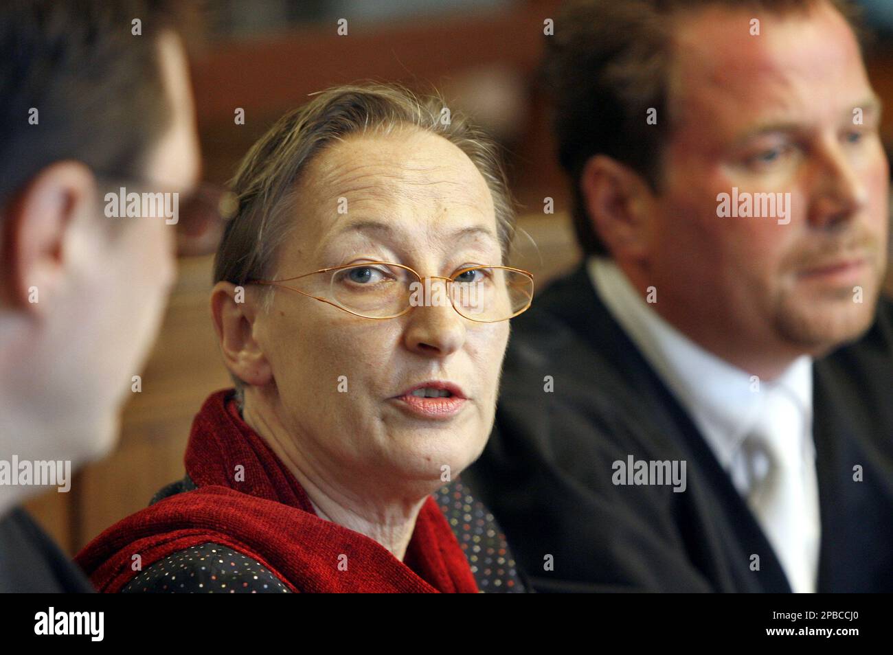 Irene Becker, center, a former nurse at the Charite hospital in Berlin ...