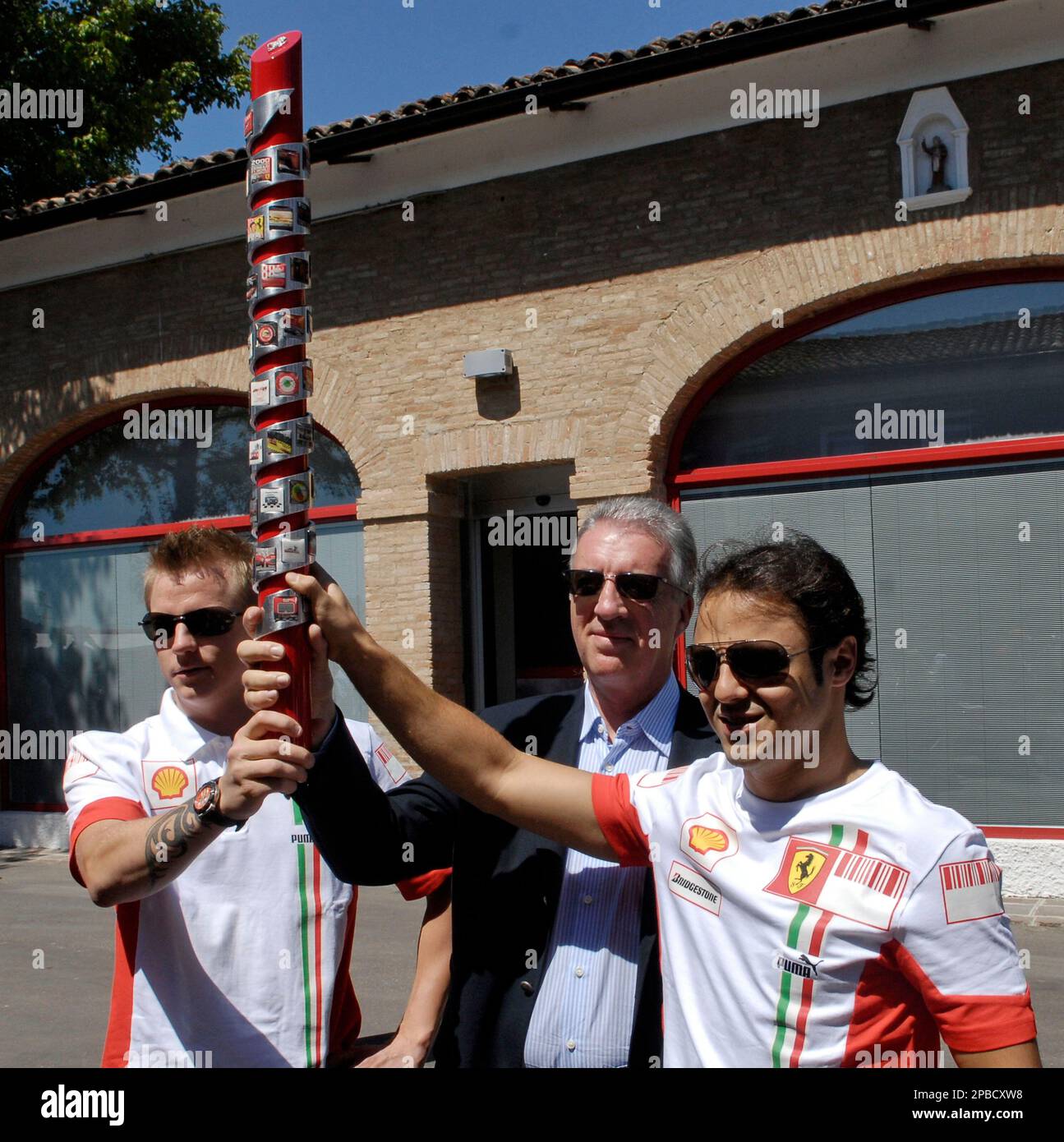 Ferrari Formula One drivers Felipe Massa, right, and Kimi Raikkonen ...