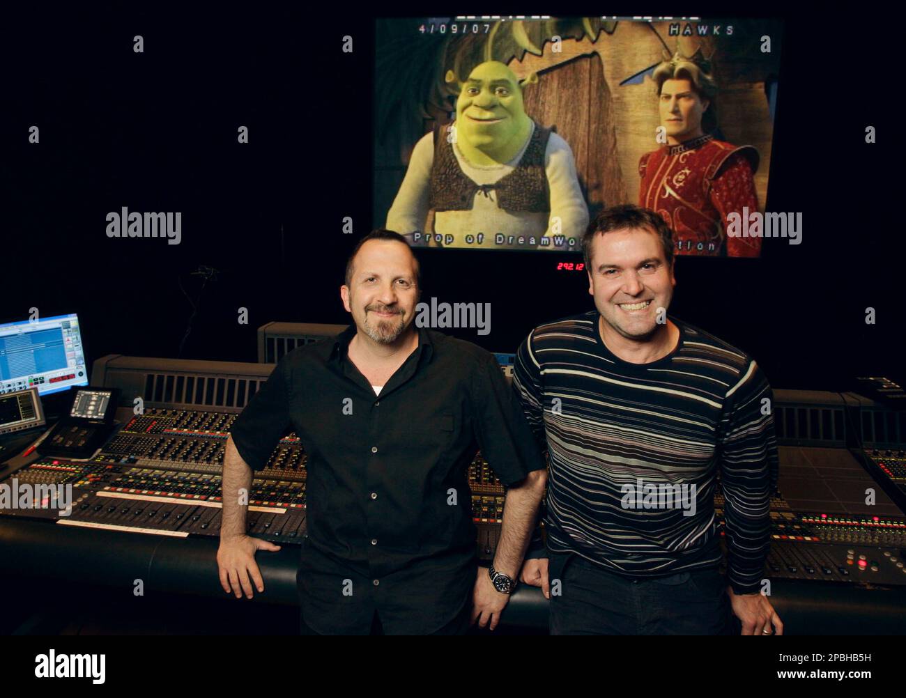 ** TO GO WITH SHREK 3 ** Producer Aron Warner, left, and director Chris Miller pose for a photo ...