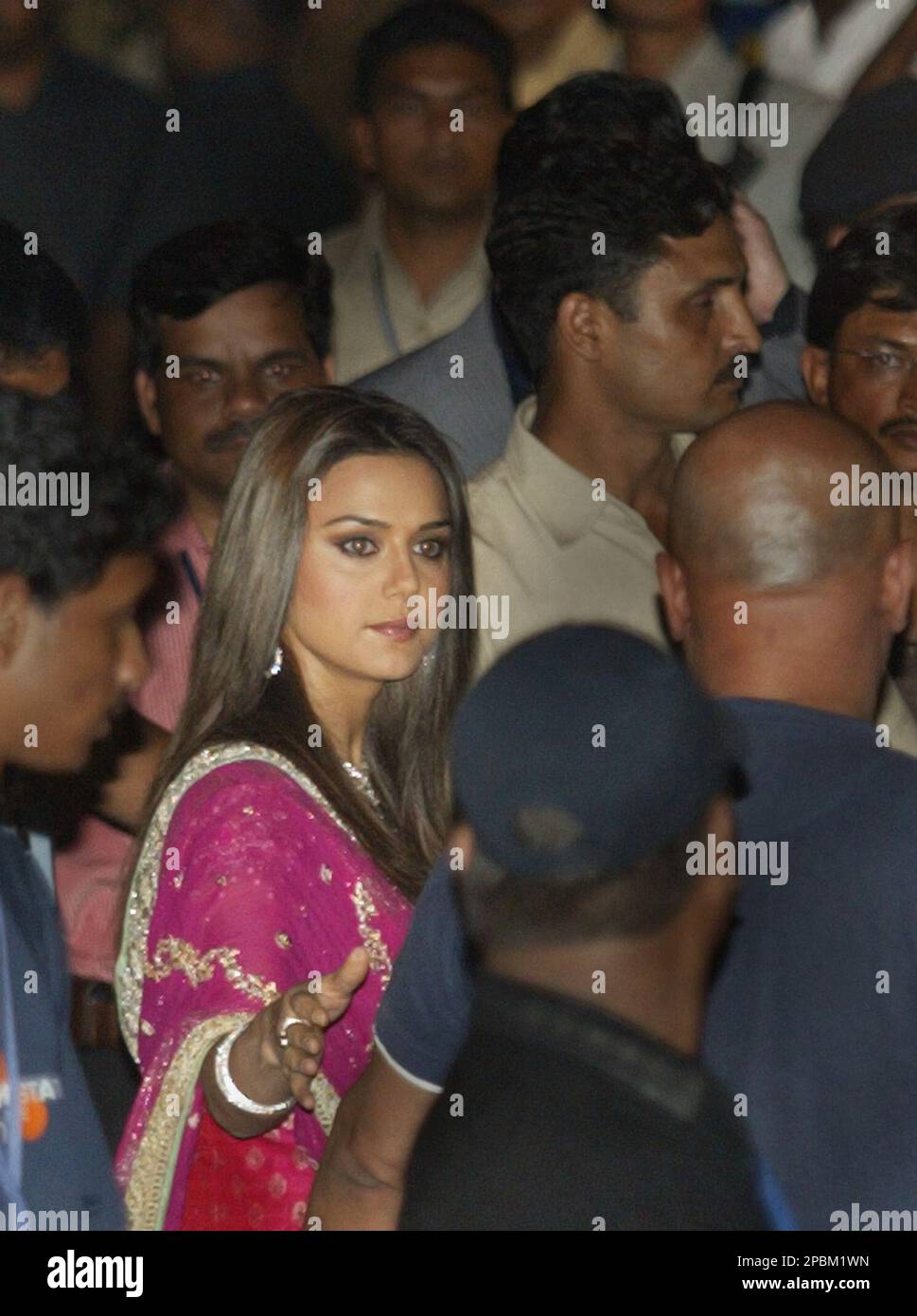 Bollywood actor Preity Zinta, center, arrives at 'Prateeksha', the ...
