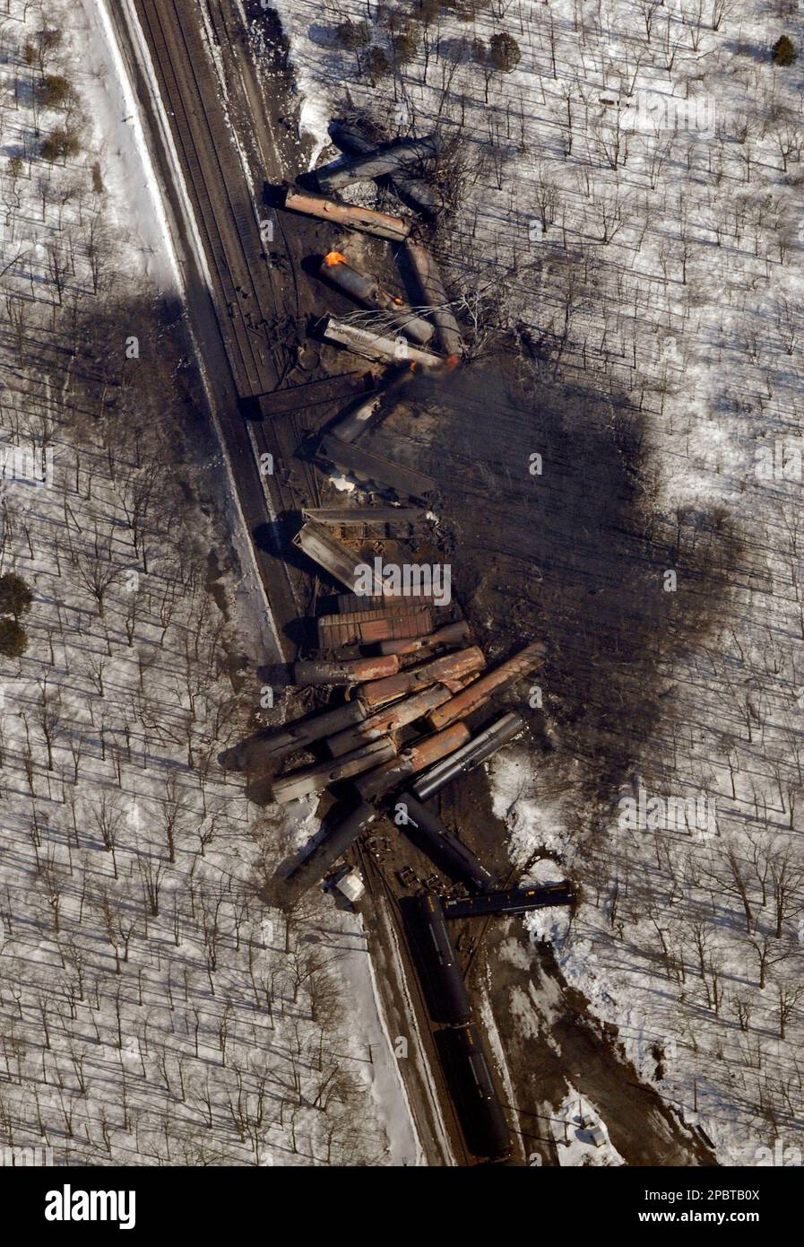 Cars from a freight train are strewn along railroad tracks in Oneida, N ...