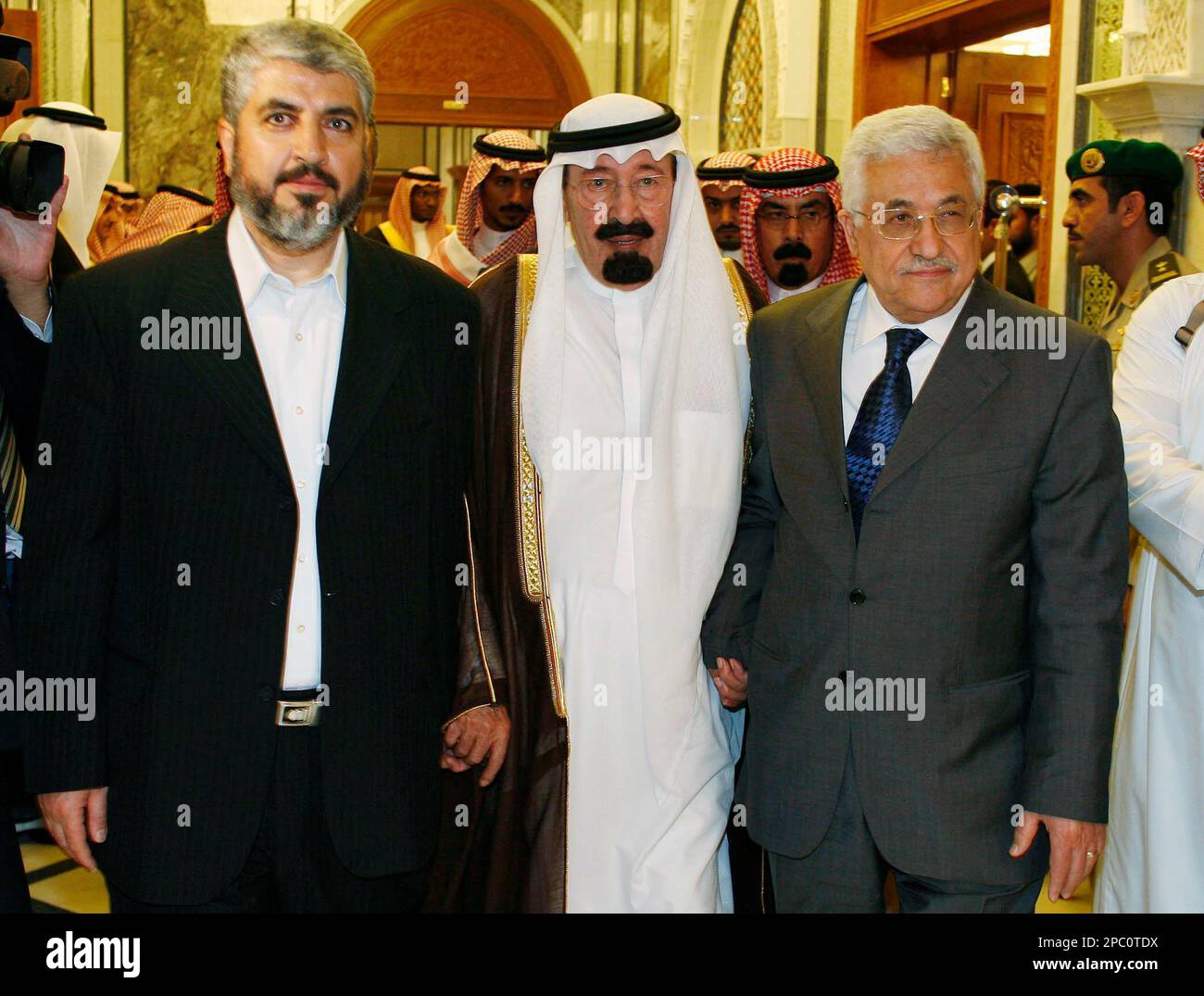Saudi Arabia King Abdullah, center, Palestinian President Mahmoud Abbas, right, and Hamas leader ...