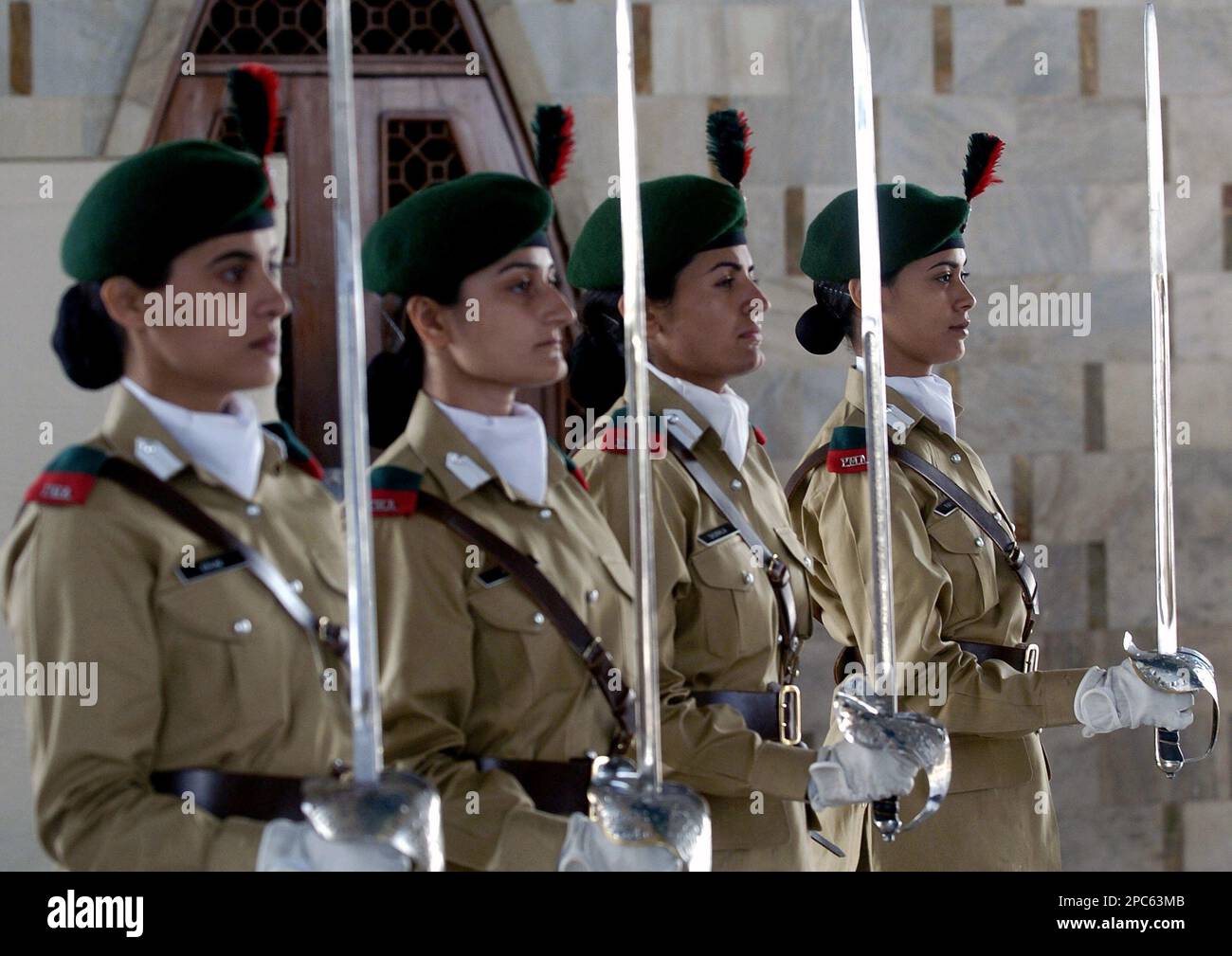 Female cadets of Pakistan Army stand guard at the mausoleum of Quaid-e ...