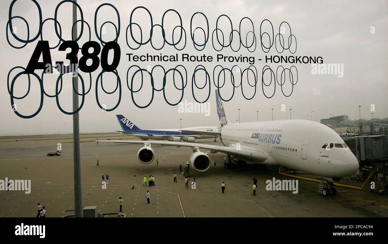 An Airbus A380 jet sits at the terminal at Chek Lap Kok airport ...