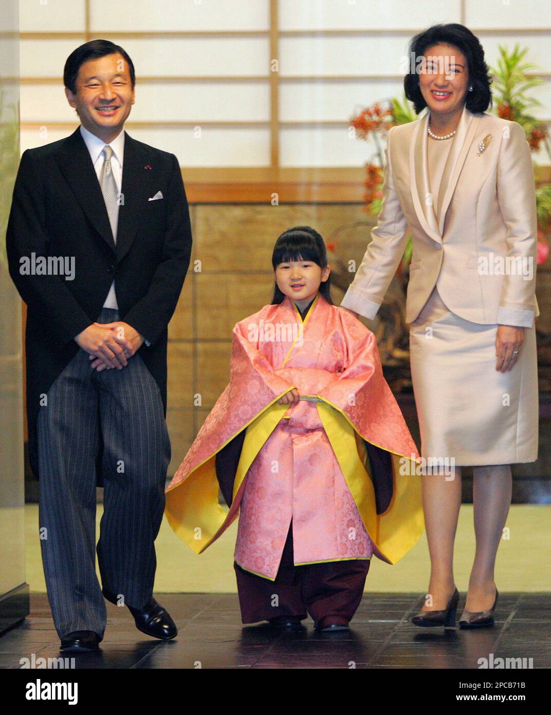 Japan's Princess Aiko, clad in traditional ceremonial costume, appears ...
