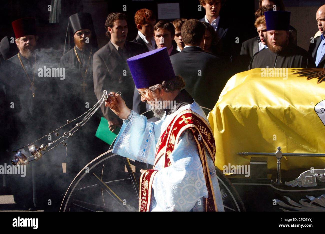 A Russian Orthodox priest blesses the coffin of Czarina Maria ...