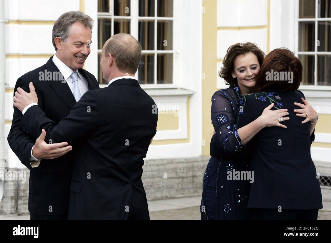 Russian President Vladimir Putin, second left, and his wife Lyudmila ...