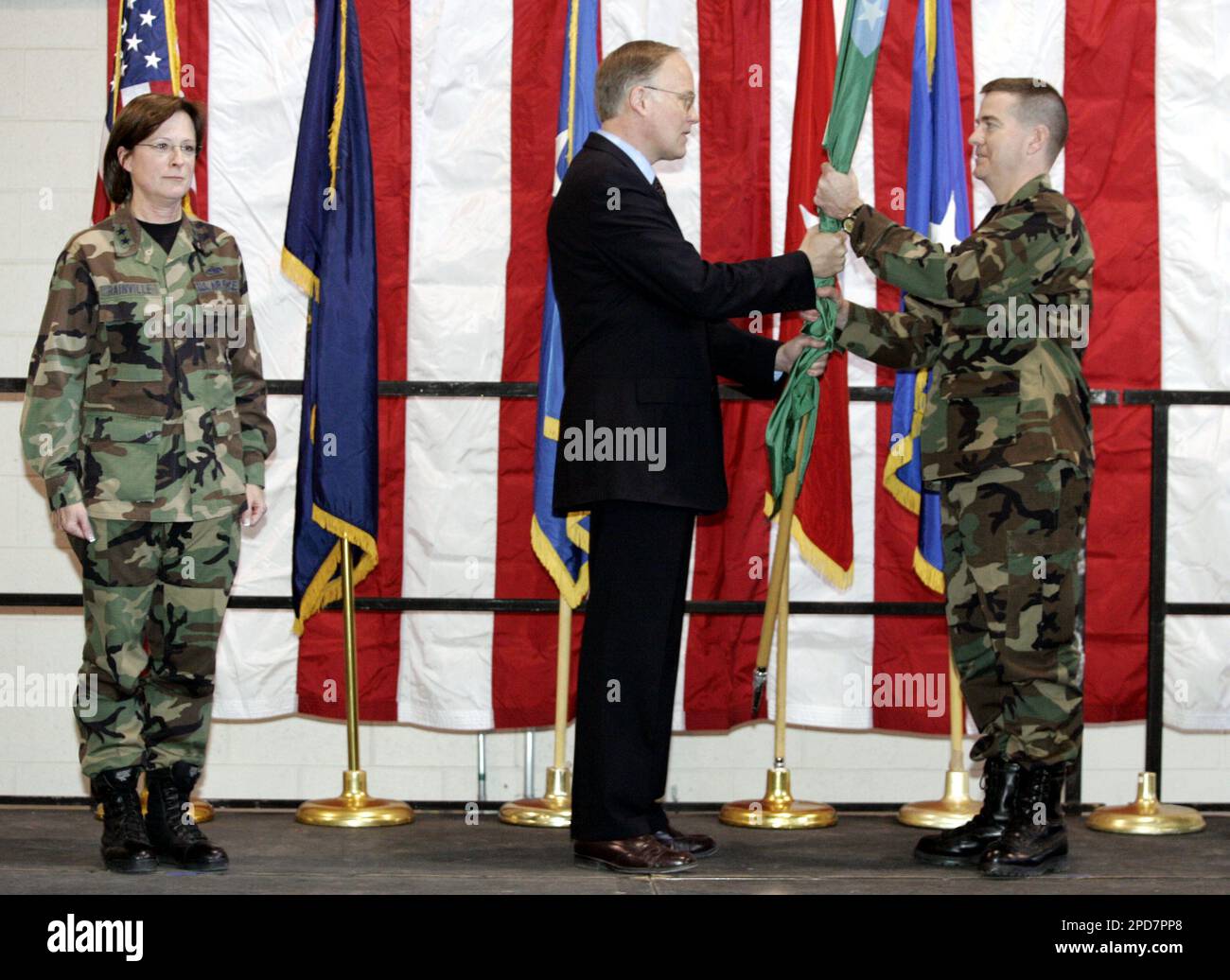 Vermont National Guard Major General Martha Rainville, left, looks on ...