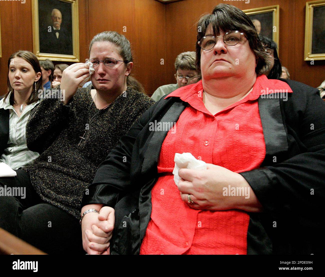 Trena Gage, left, mother of Jetseta Gage, 10, wipes away tears while ...
