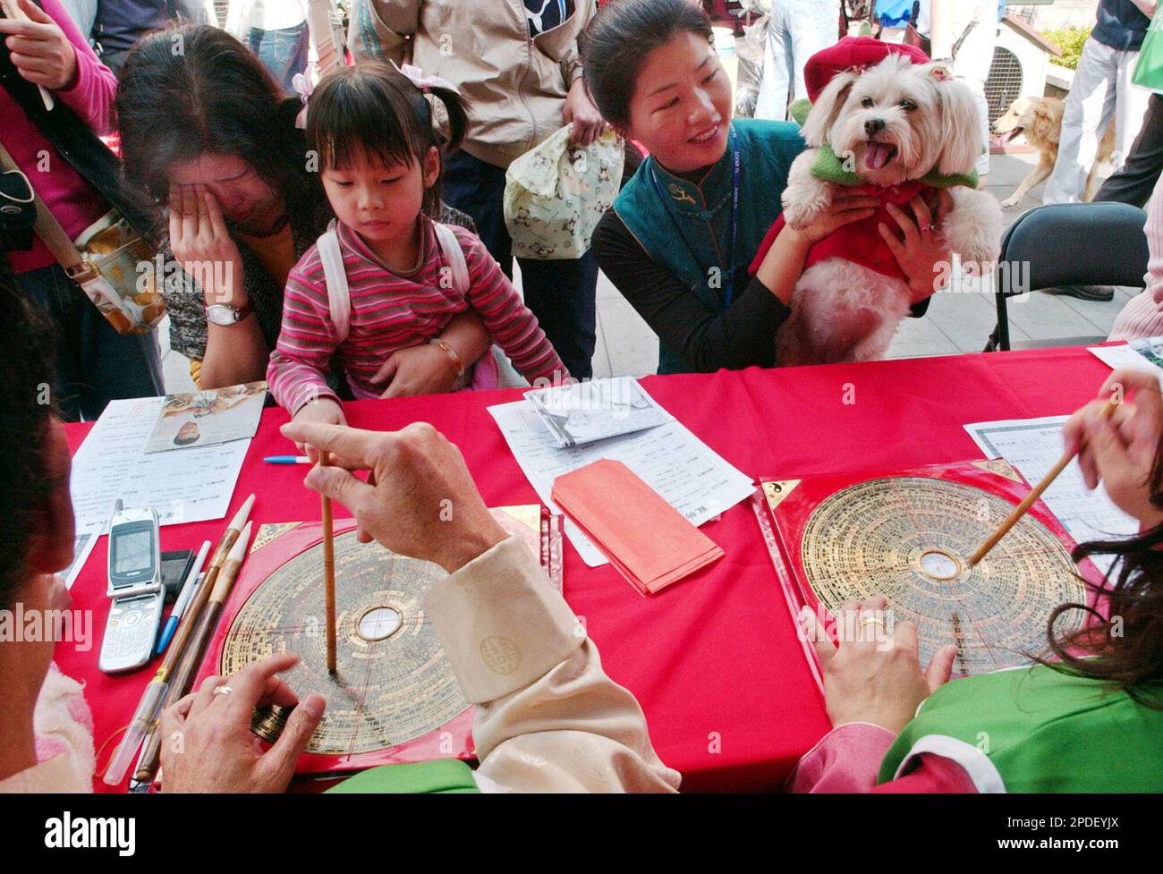 Taiwanese fortune tellers use Fung Shui maps to read the character and ...