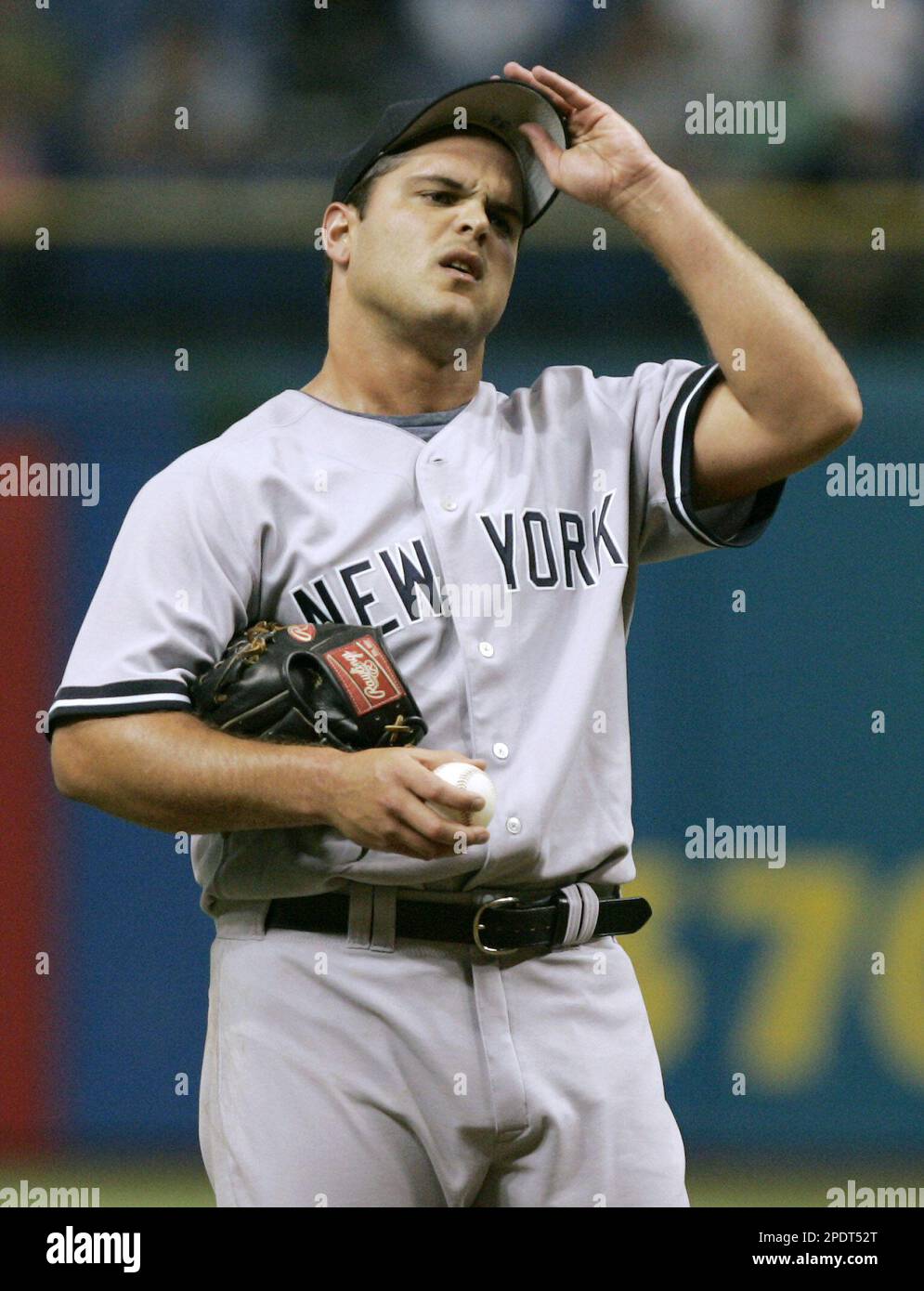 New York Yankees pitcher Jaret Wright wipes his forehead after giving ...
