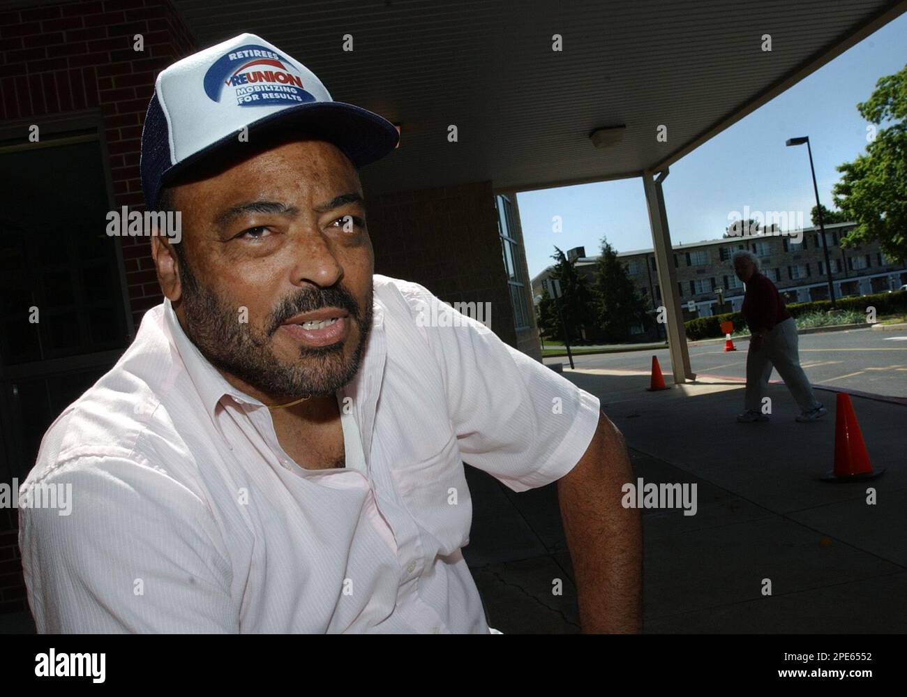 James Roberts talks outside Harrisburg Academy, Thursday, May 12, 2005 ...