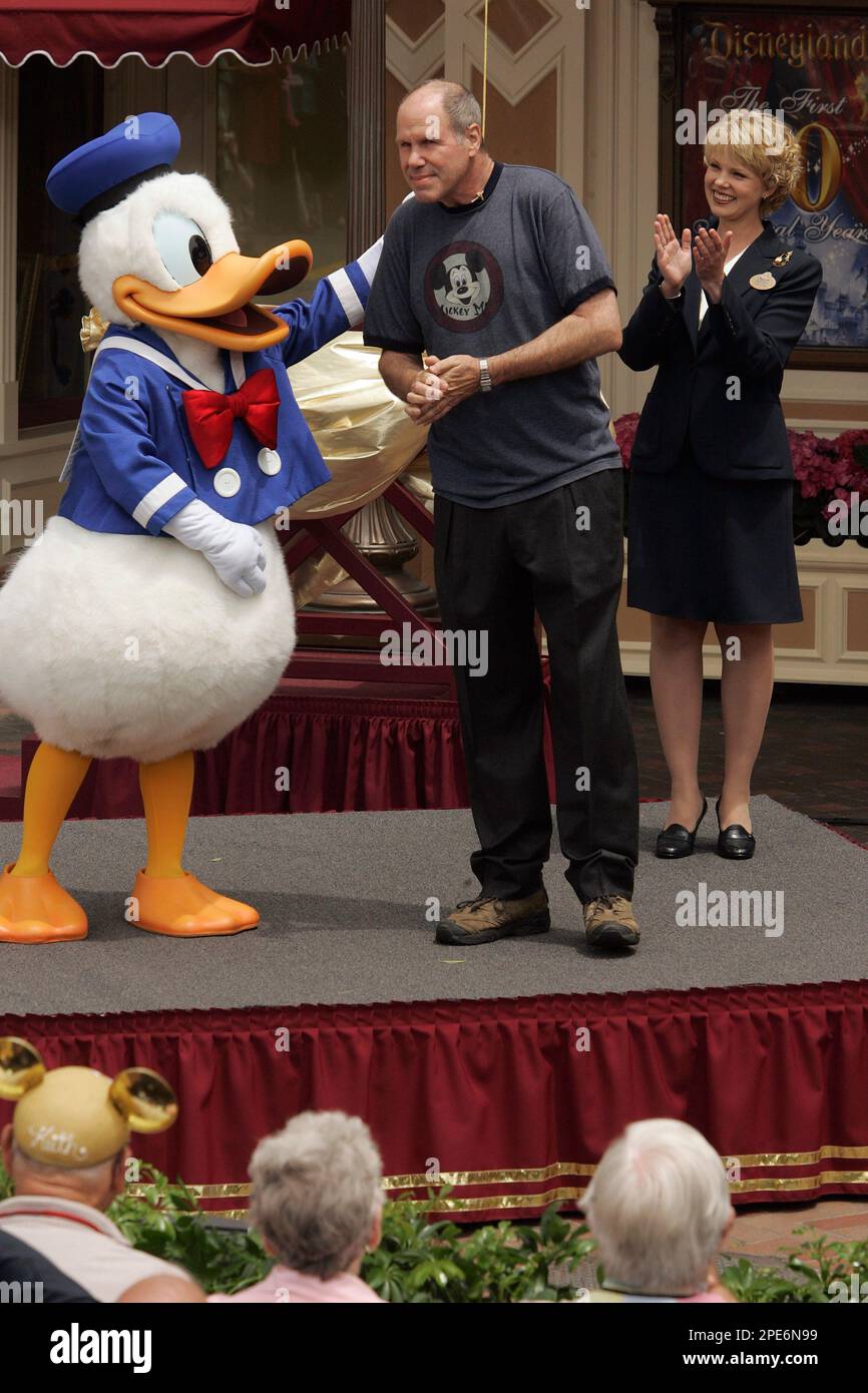 Disneyland Ambassador 2005 Rebecca Phelps-Davis, right, Michael Eisner ...
