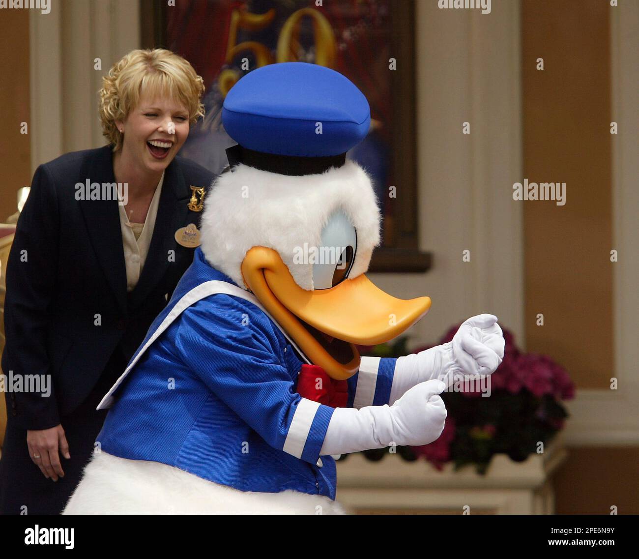 Disneyland 2005 Ambassador Rebecca Phelps, left, laughs as Disney ...