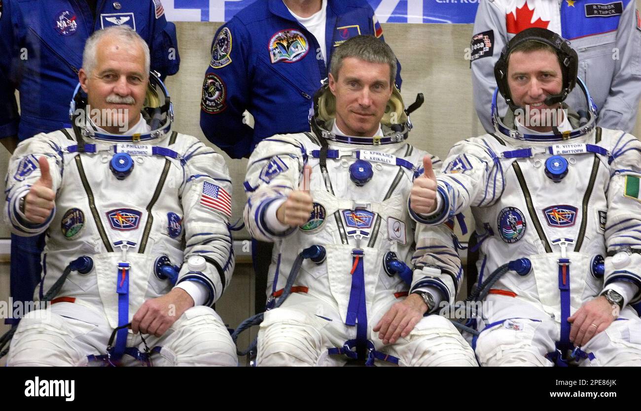 International space crew, from the left, American NASA astronaut John ...