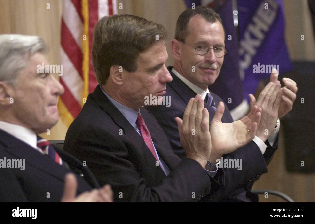 Sen. John W. Warner, left, R-Va., Virginia Gov. Mark R. Warner, center ...