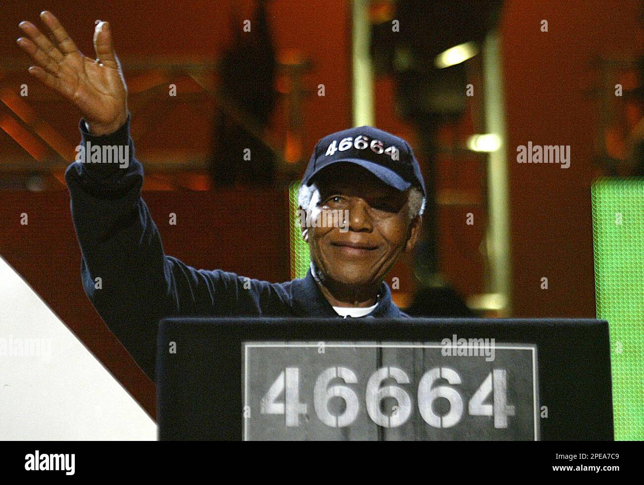 South Africa's former President Nelson Mandela greets the crowd before ...