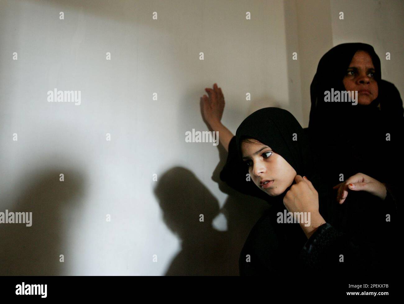 Relatives of Palestinian militant Rezek Al Mansi mourn in the family ...