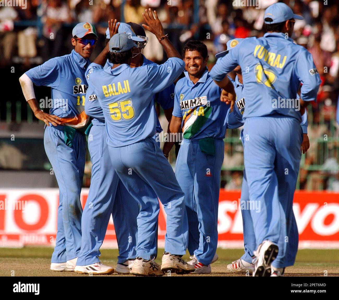 Indias Sachin Tendulkar, facing camera, celebrates the dismissal of Sri ...