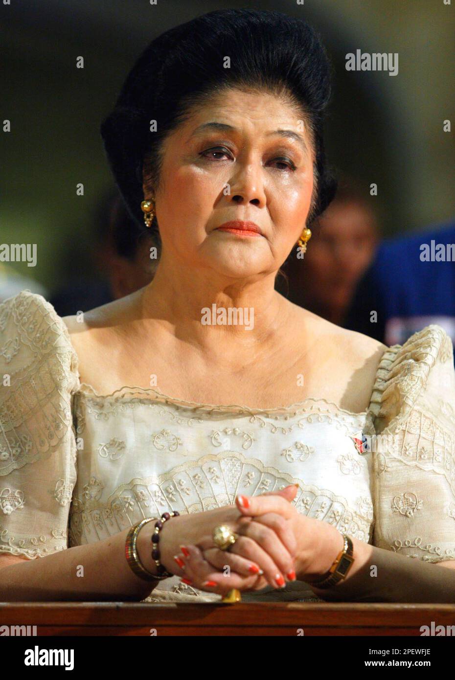 Flamboyant former Philippine first lady Imelda Marcos prays as she ...