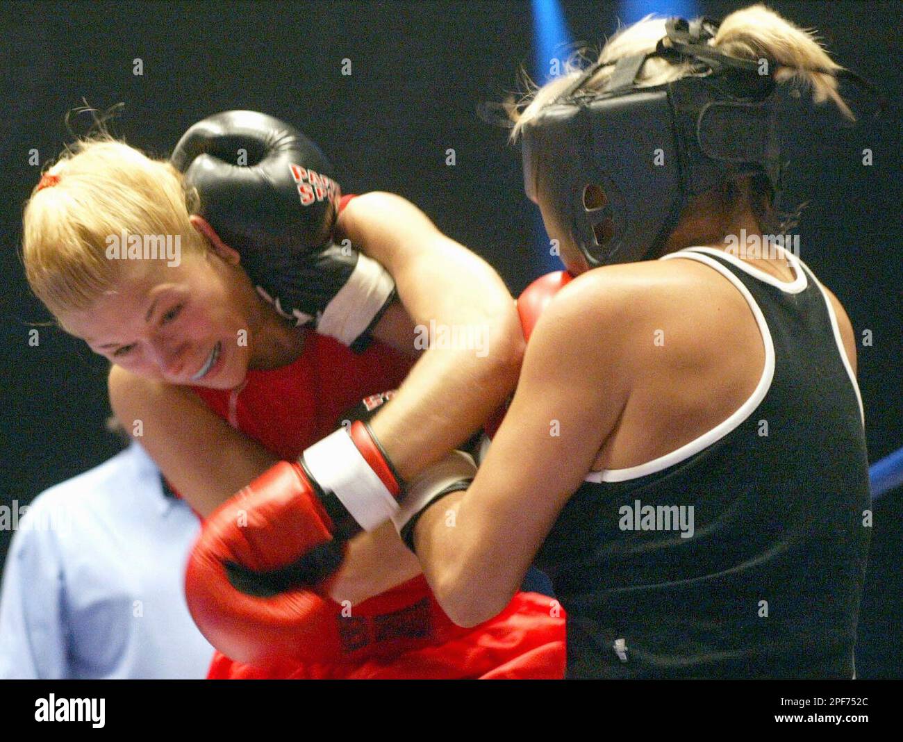 British pop singer Samantha Fox, right, punches former German figure ...