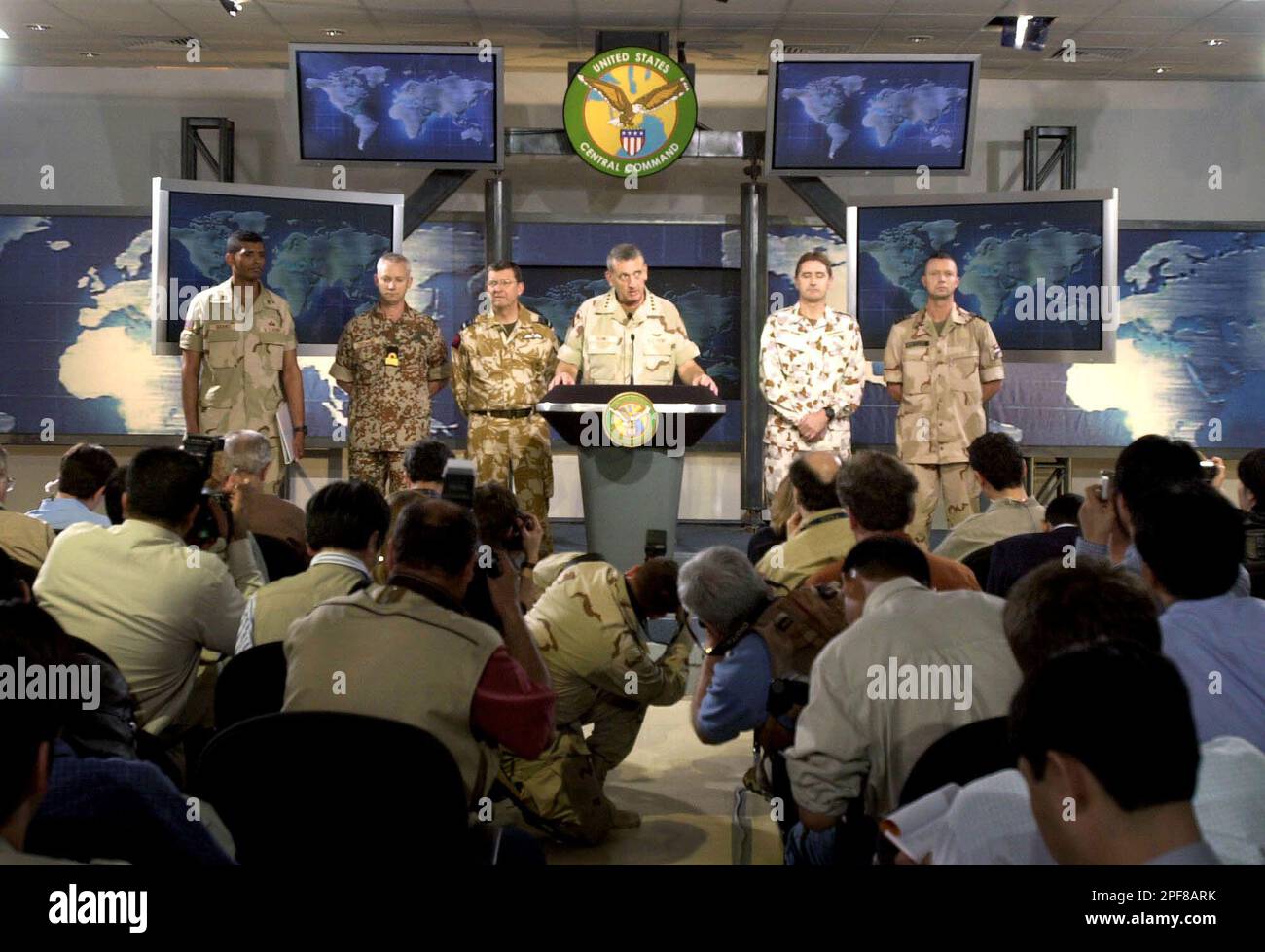American General Tommy Franks, center, speaks to the media, as American ...