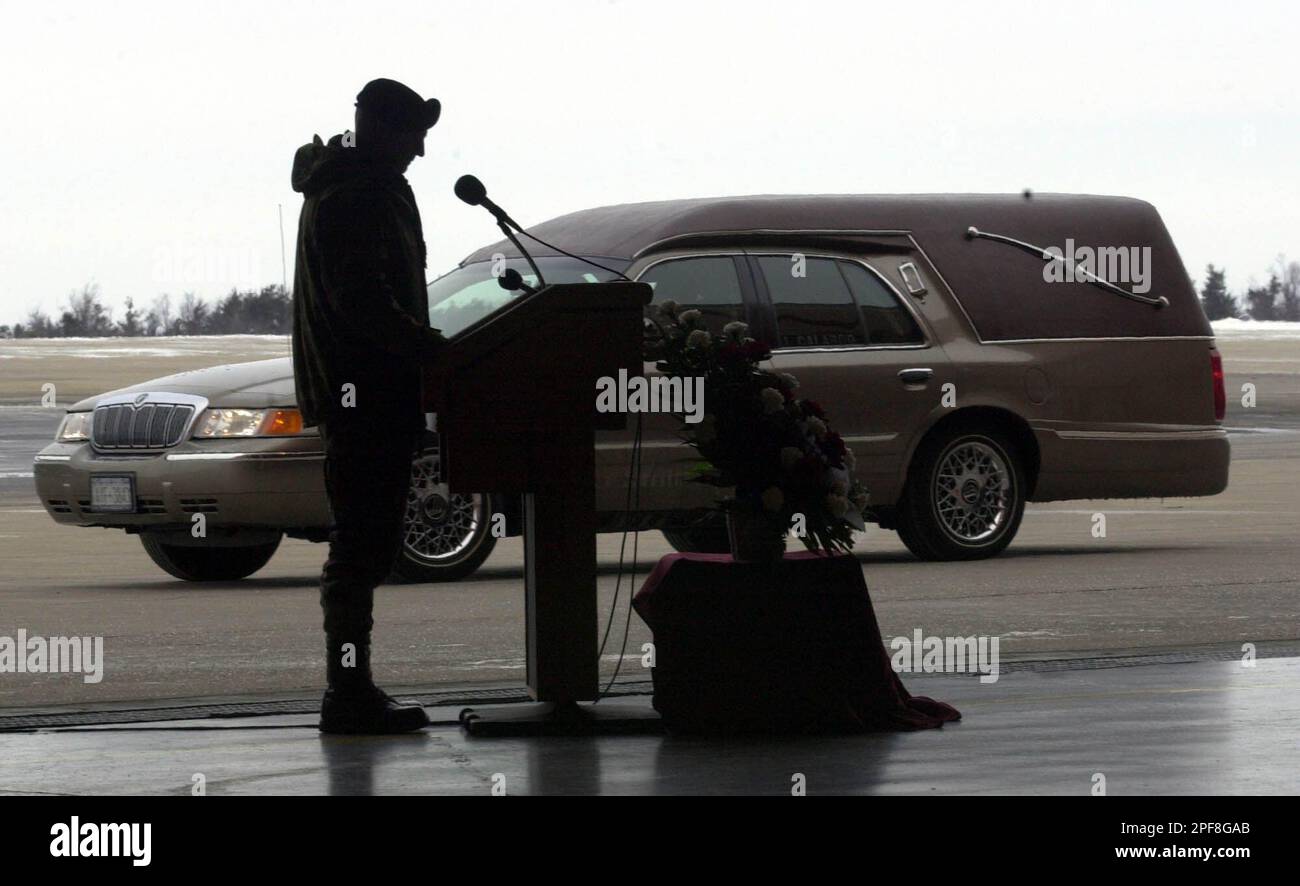 Col. David Gray, Fort Drum's deputy chief of staff reads a biography as ...