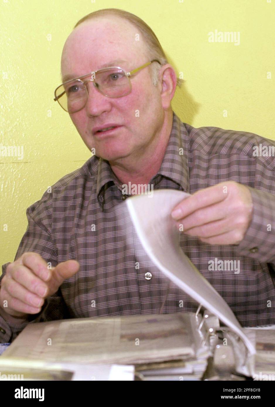 ** ADVANCE FOR SUNDAY MARCH 16 ** Al Plucker flips through a scrapbook ...