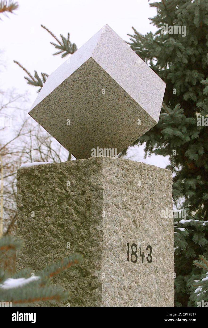 A granite cube on a pedestal, pictured Jan. 19, 2003, has been standing ...
