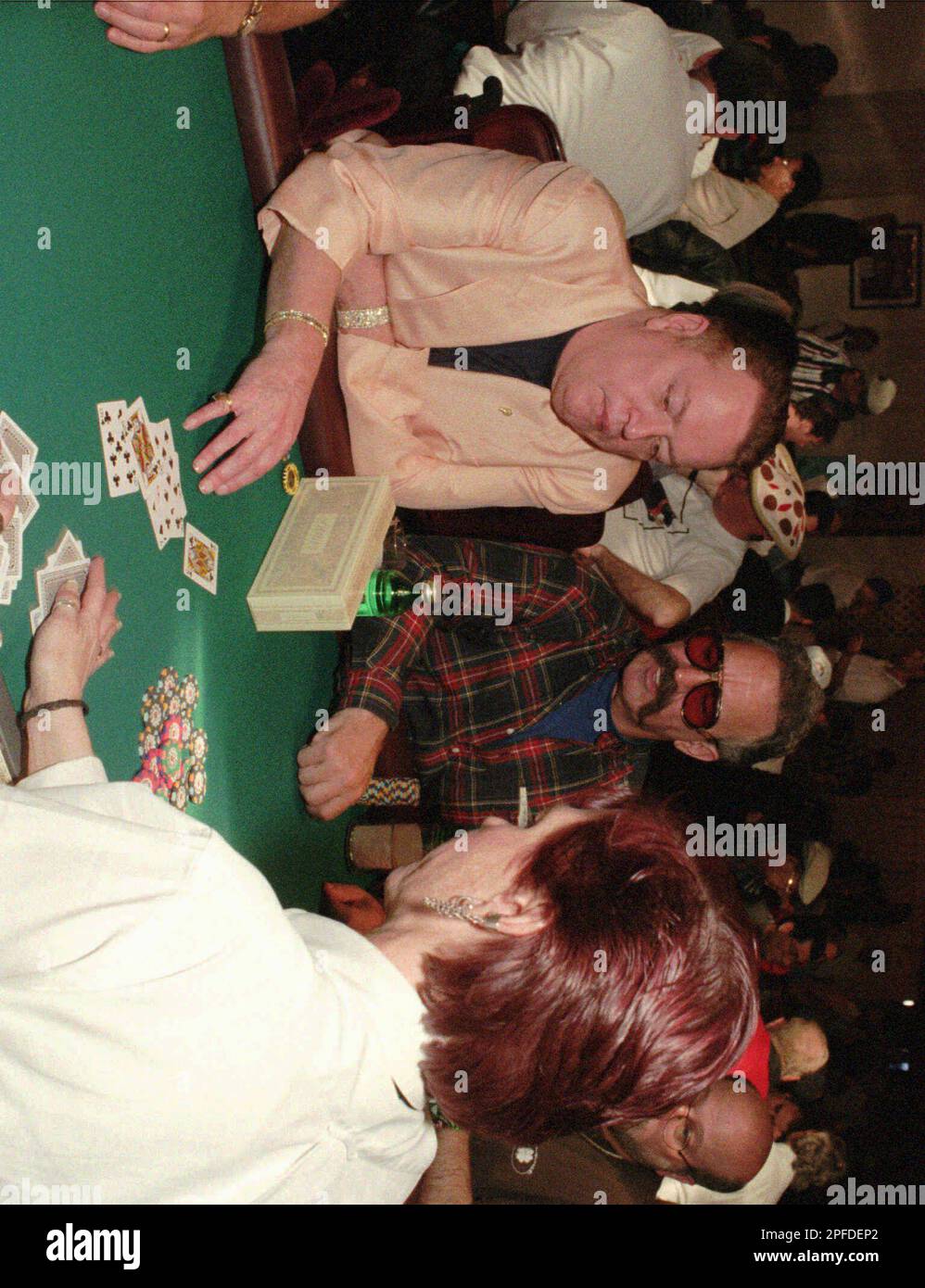 Larry Flynt, publisher of Hustler Magazine, left, displays his winning ...