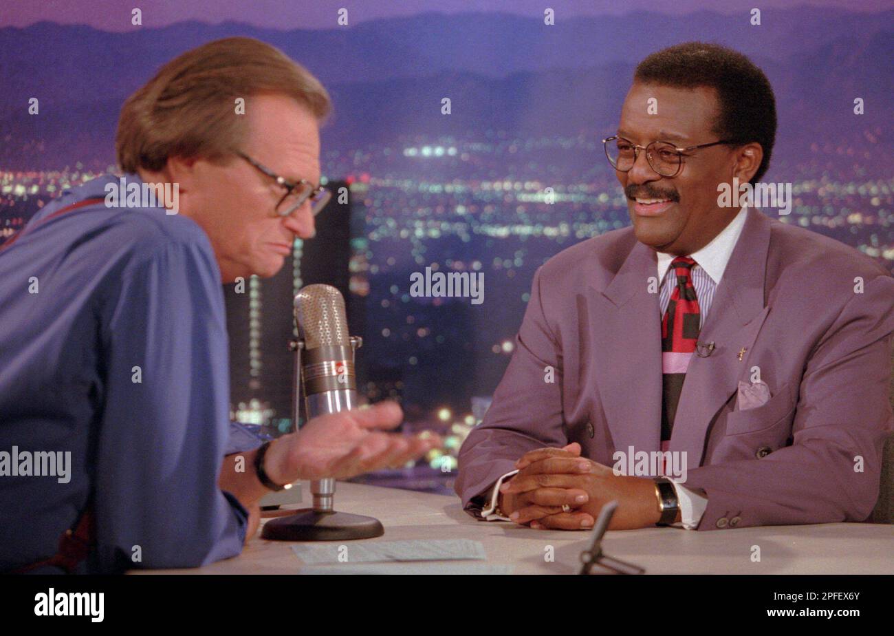 Defense attorney Johnnie Cochran Jr., right, sits for an interview with ...