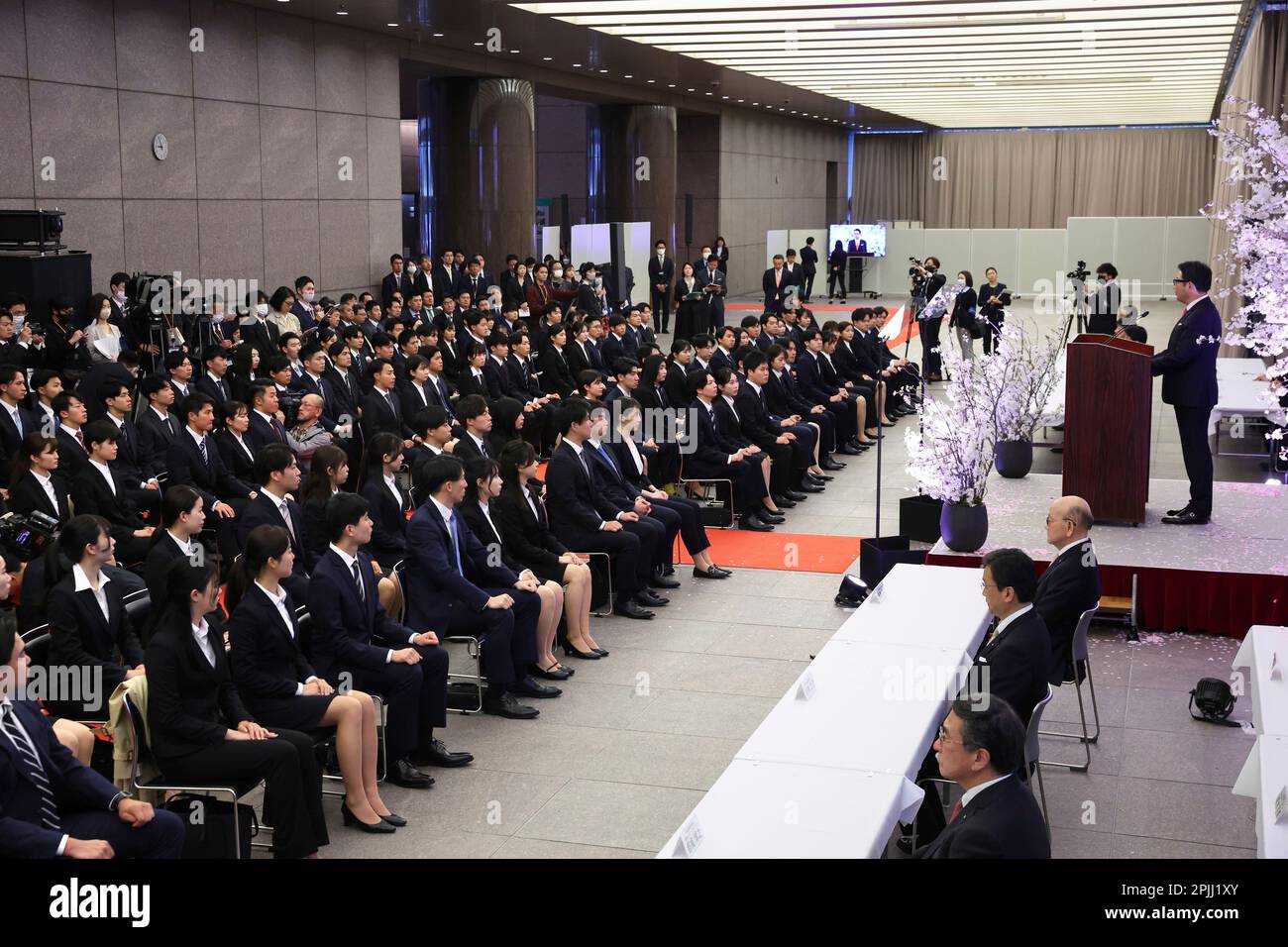 New employees attend an entrance ceremony at Itochu Co. headquarter in ...