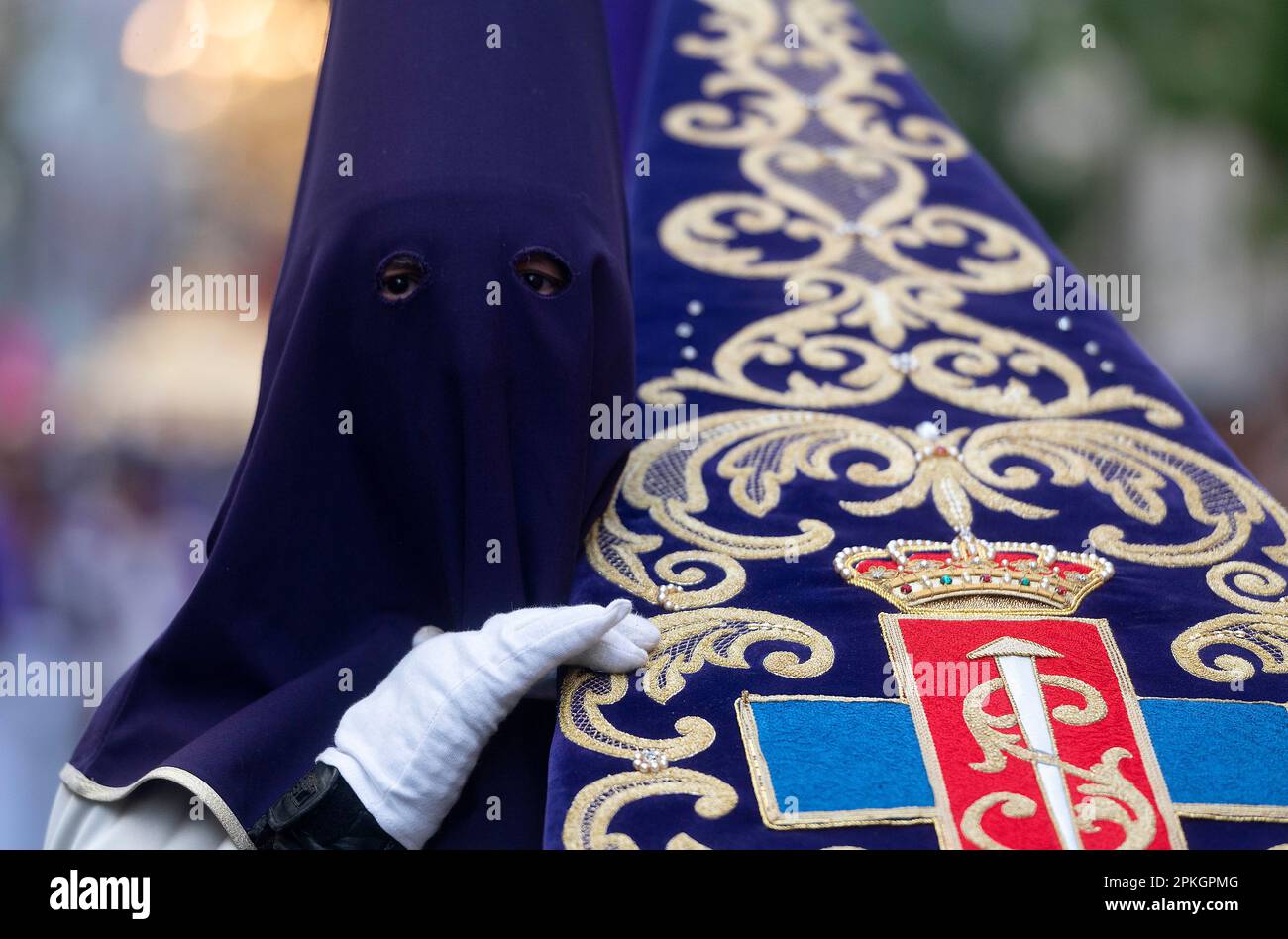 A Nazarene during the procession of the Christ of Medinaceli, on April ...