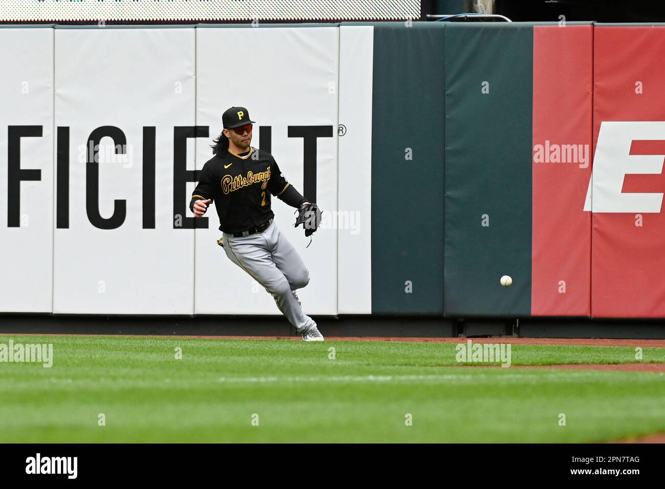 Pittsburgh Pirates right fielder Connor Joe chases the ball after a hit ...