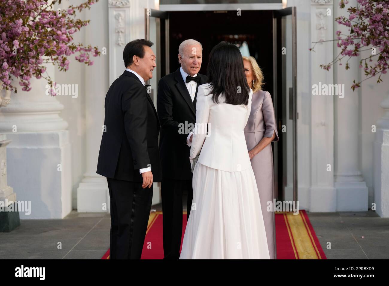 President Joe Biden and first lady Jill Biden greet South Korea's first ...