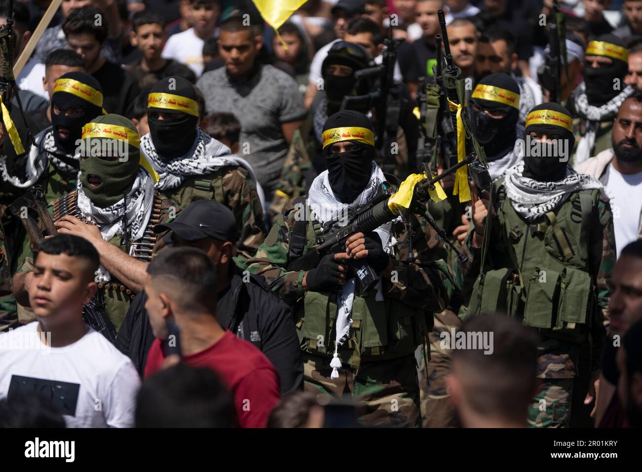 Militants from Al-Aqsa Martyrs Brigades, Fatah military wing, attend ...