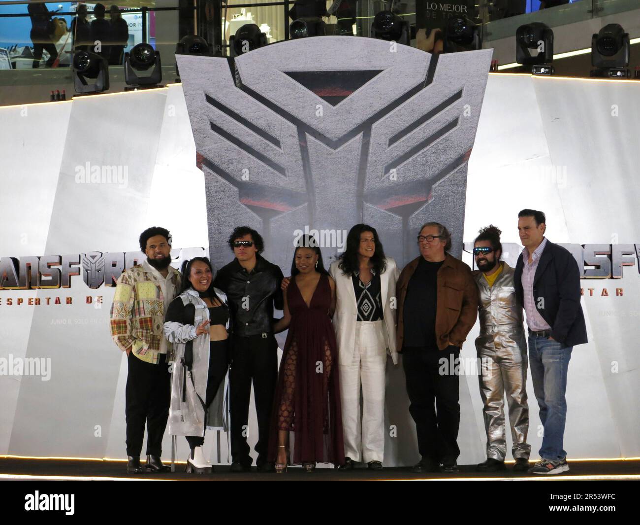 The cast and crew of the film Transformers: Rise of the Beasts pose for a group photo on the red ...