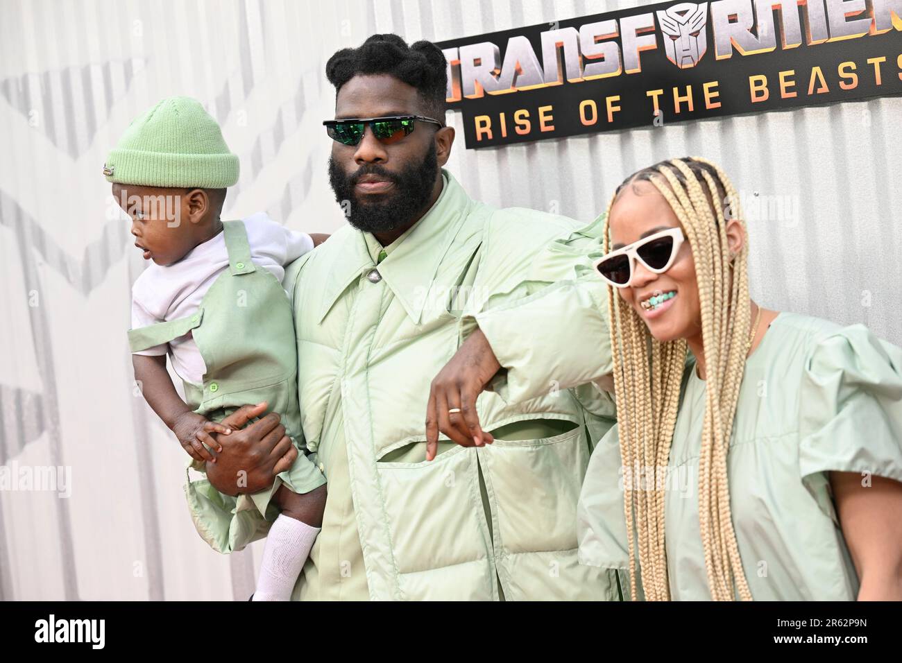 Tobe Nwigwe, center, his wife Martica Fat Nwigwe and son attend the ...