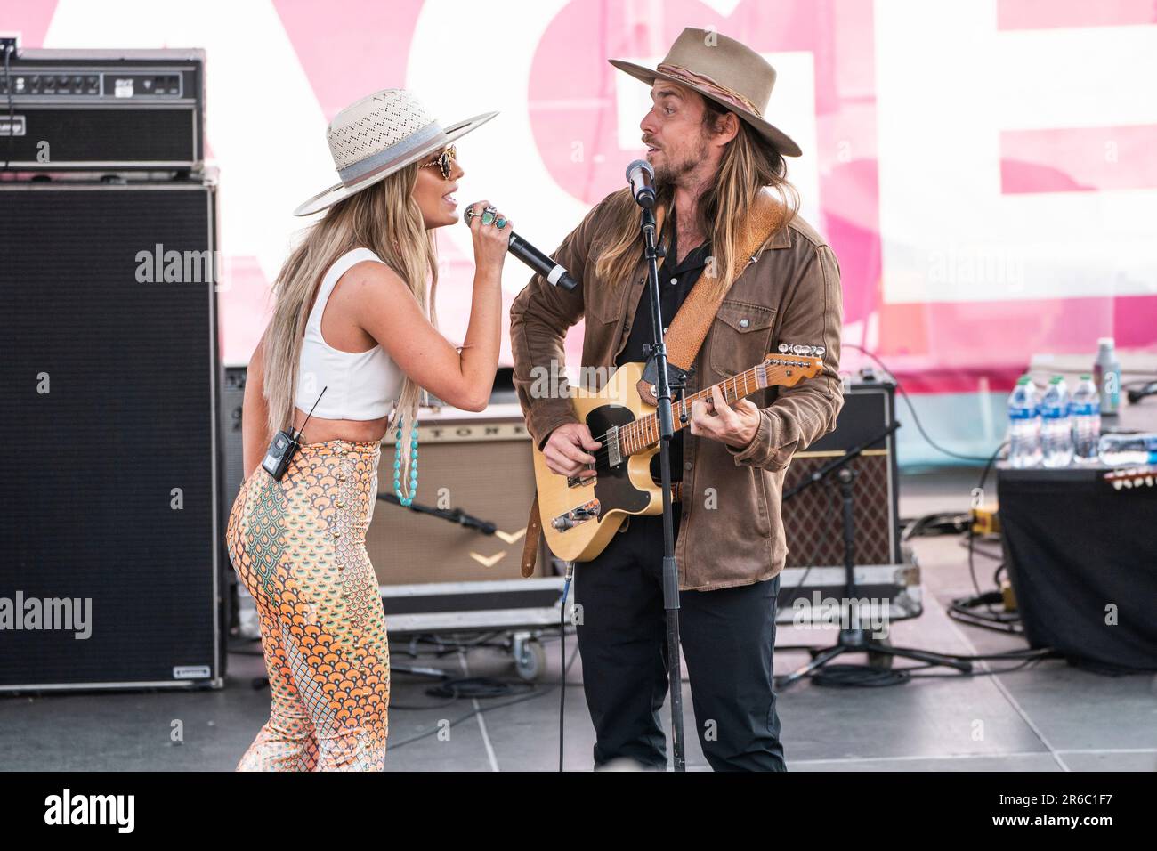 Lainey Wilson, left, and Lukas Nelson perform during the 2023 CMA Fest ...